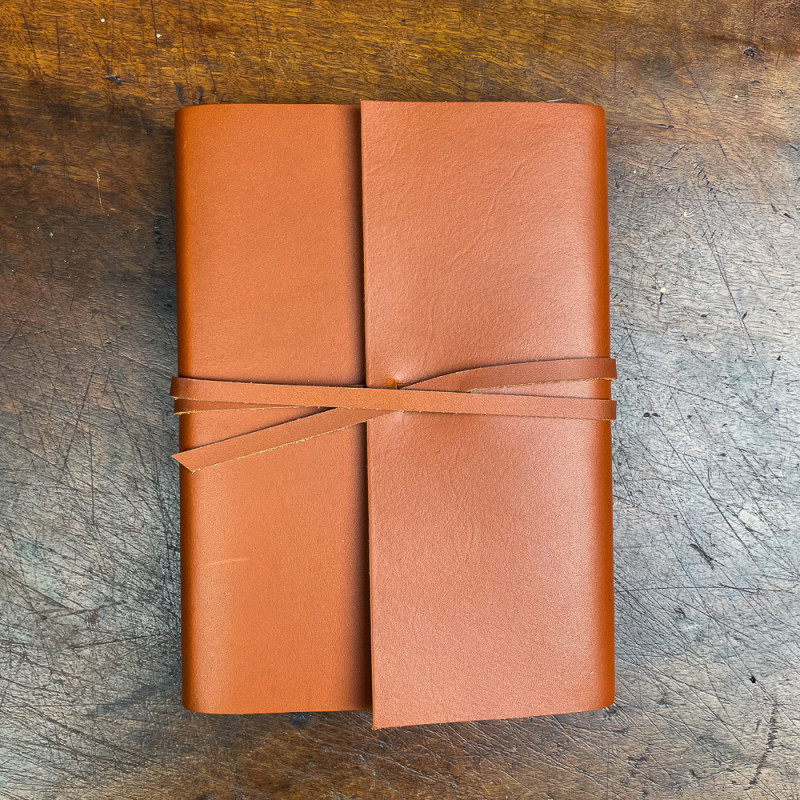 Leather adventure booklet