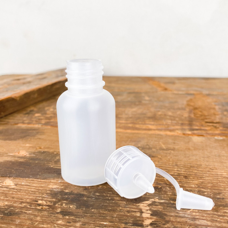 4 mini pouring bottles 0.03L