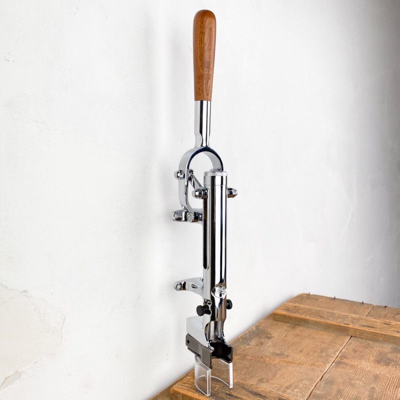 Chrome wall-mounted corkscrew