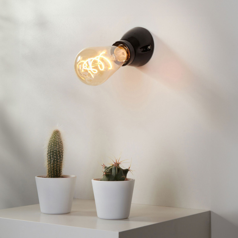 Slanted conical wall light
