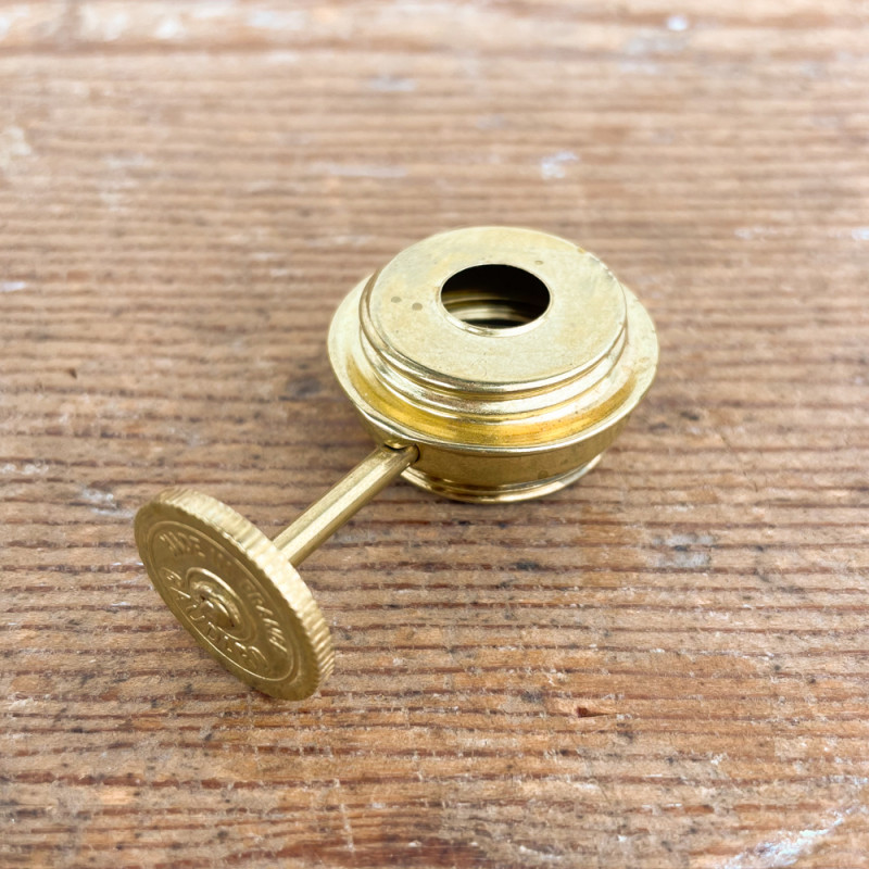 Brass lamp base with soldered key