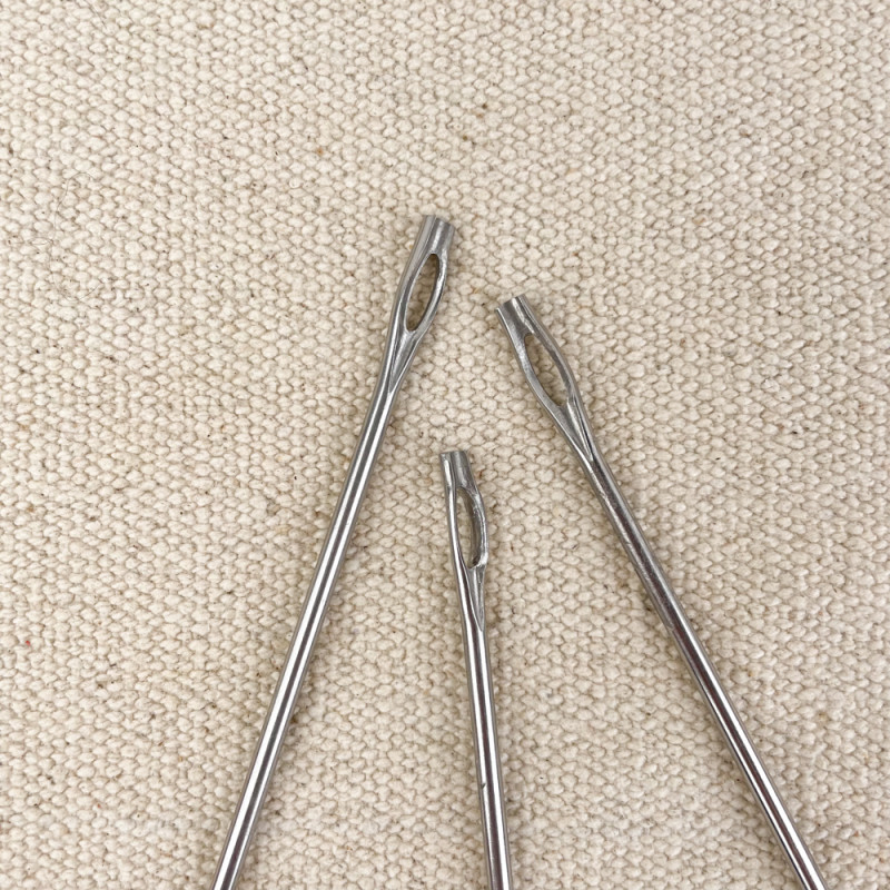 Curved larder needle
