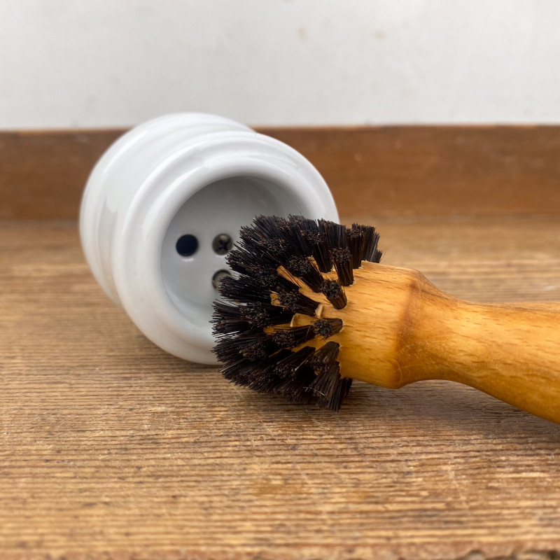 Cleaning brush for electrical outlets