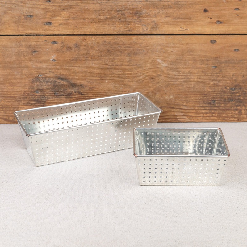 Perforated tin bread mould