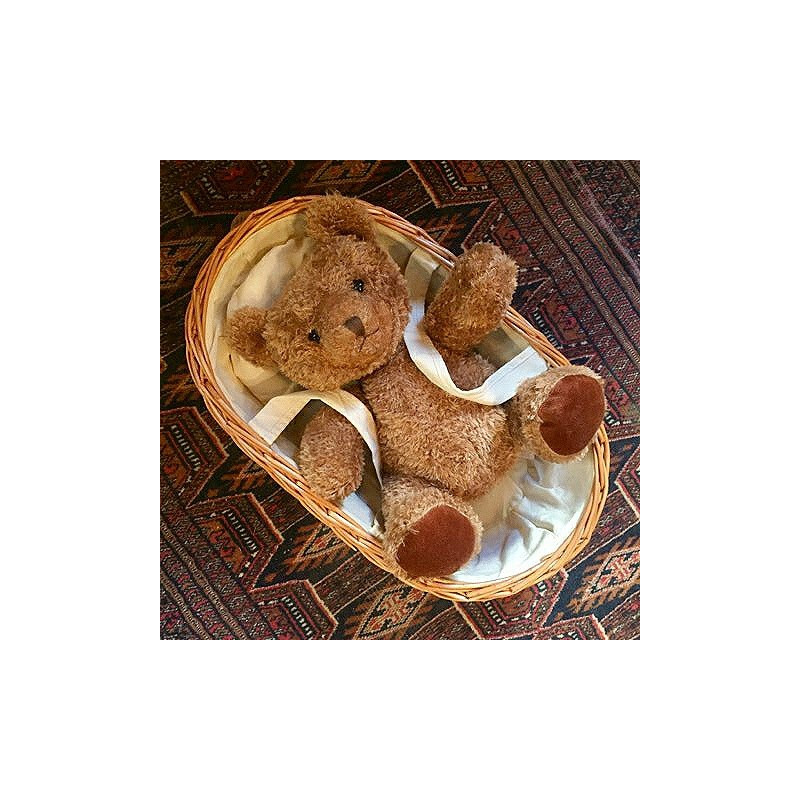 Woven wicker dolls bassinet